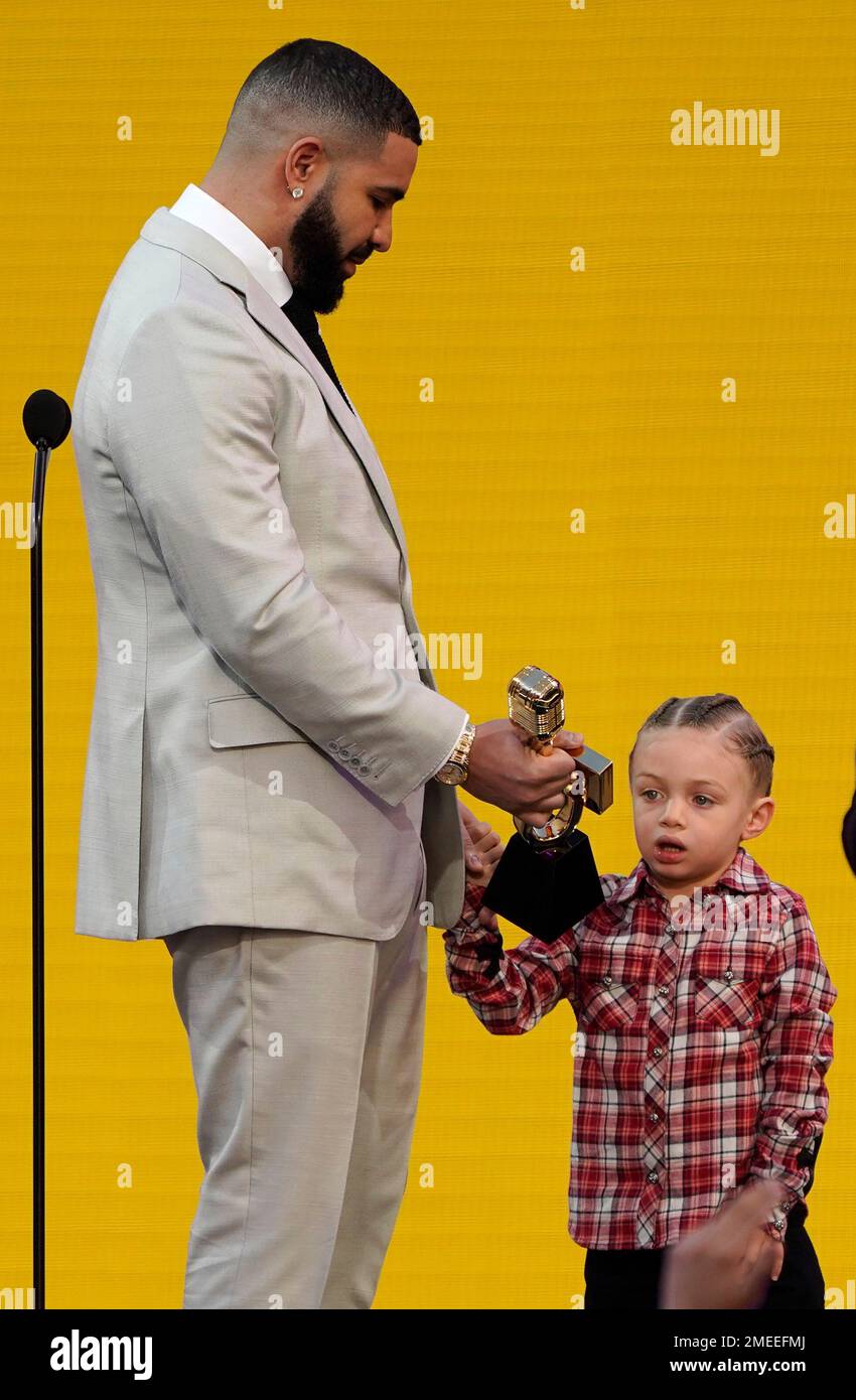 Drake gives his artist of the decade award to his son Adonis Graham at ...