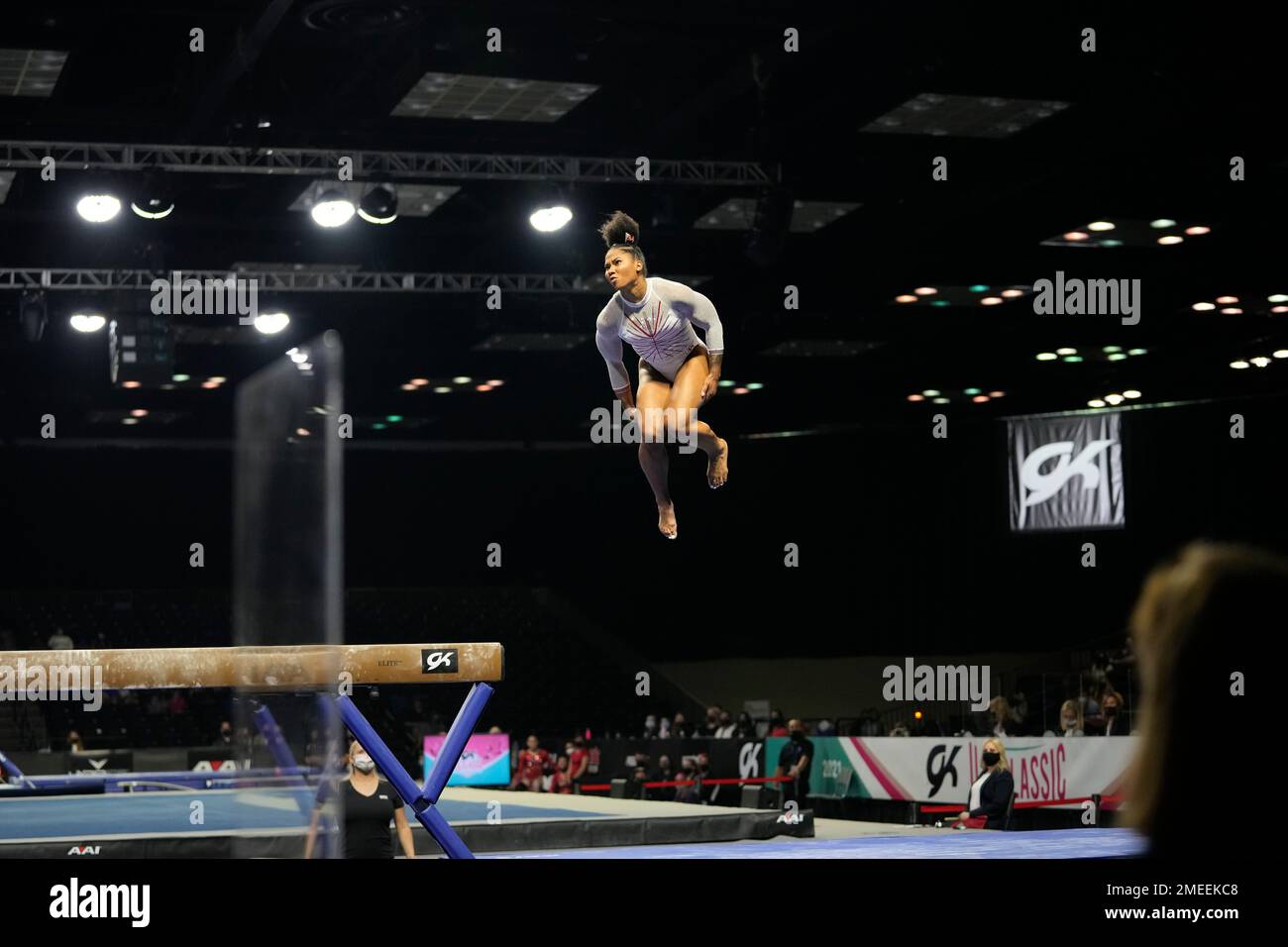 Jordan Chiles performs her balance beam routine on the uneven bars ...