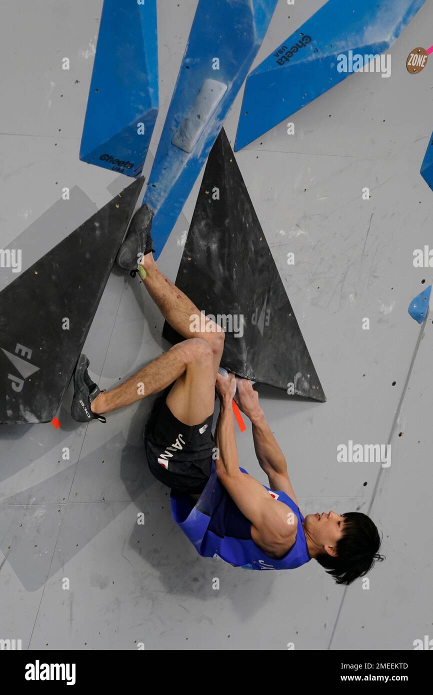 Japan's Kokoro Fujii, climbs during the men's boulder finals at the ...
