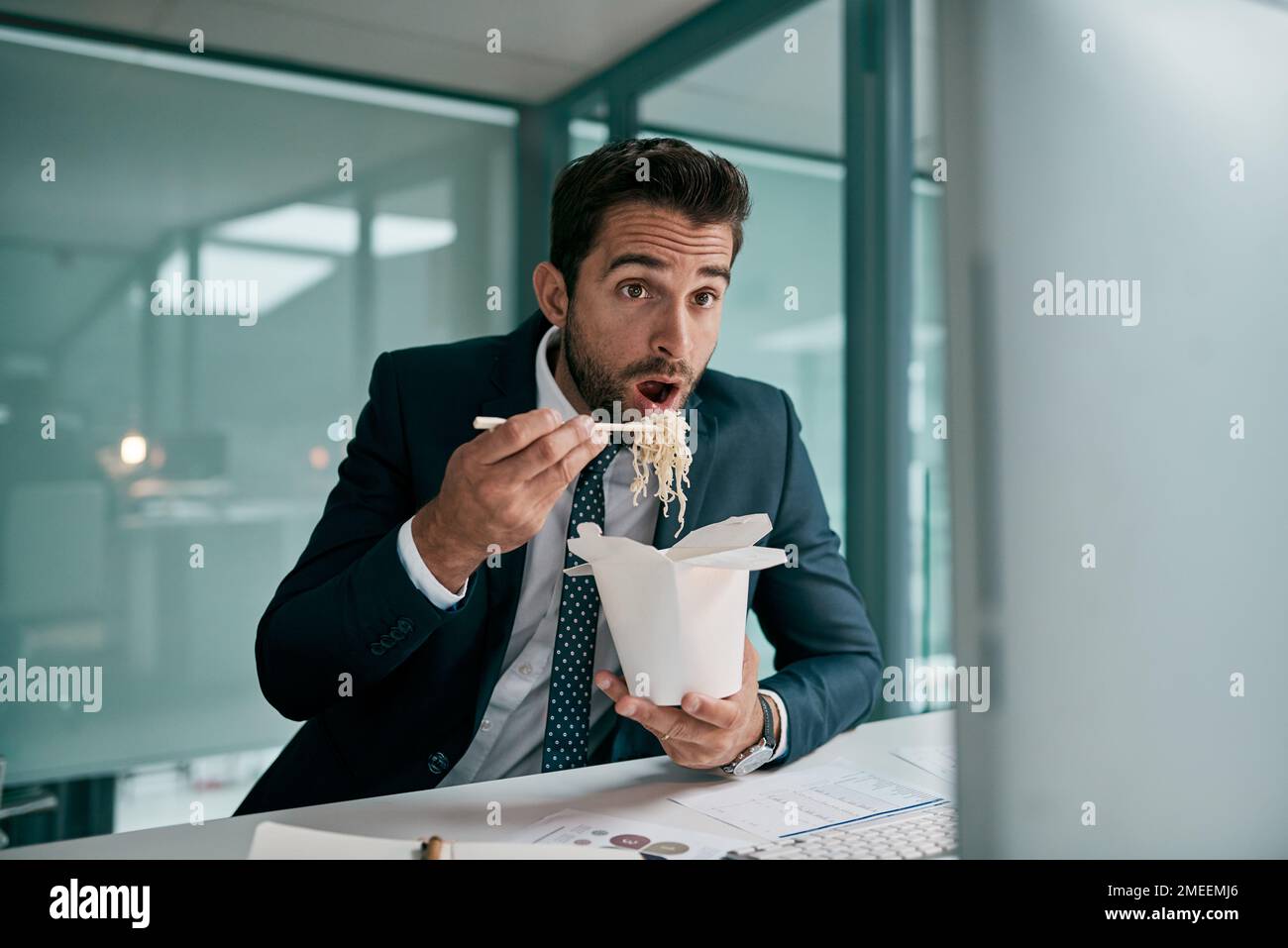 Young people eating noodles hi-res stock photography and images - Alamy