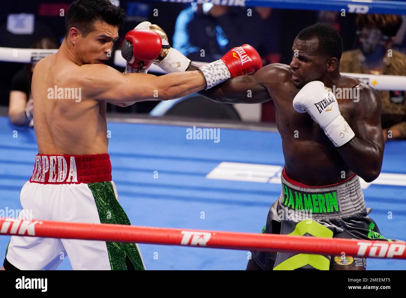 Hank Lundy, right, fights Jose Zepeda during a junior welterweight ...