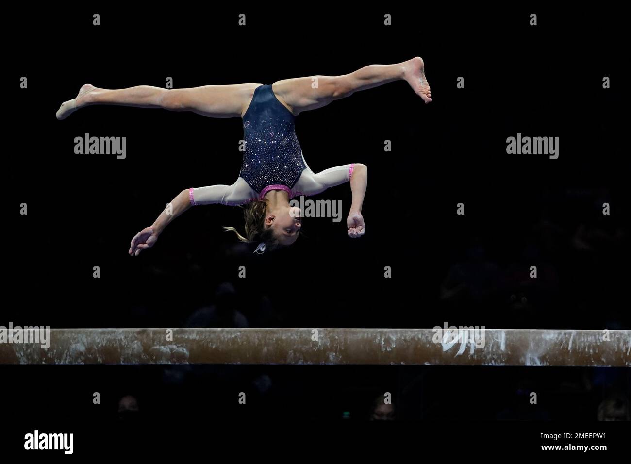 Elle Mueller performs her balance beam routine during the U.S. Classic ...