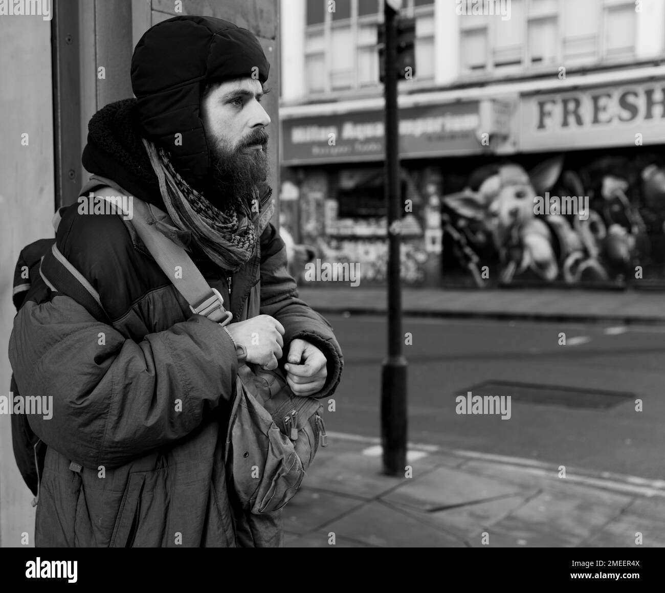 Homeless man in Manchester's Northern Quarter. Vunerable and alone as ...