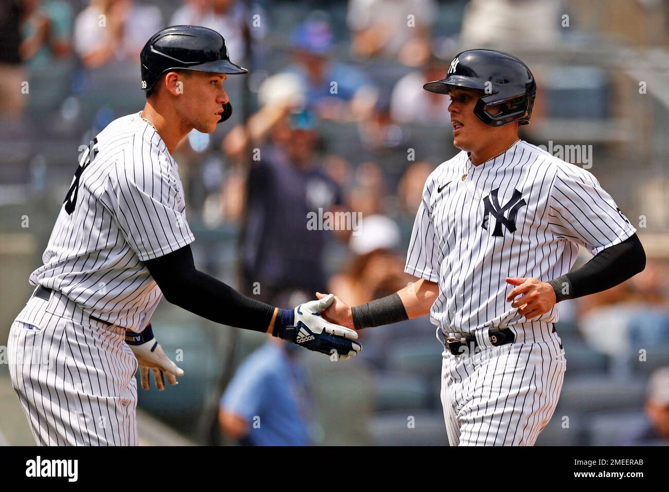 New York Yankees' Gio Urshela, right, is greeted by Aaron Judge after ...