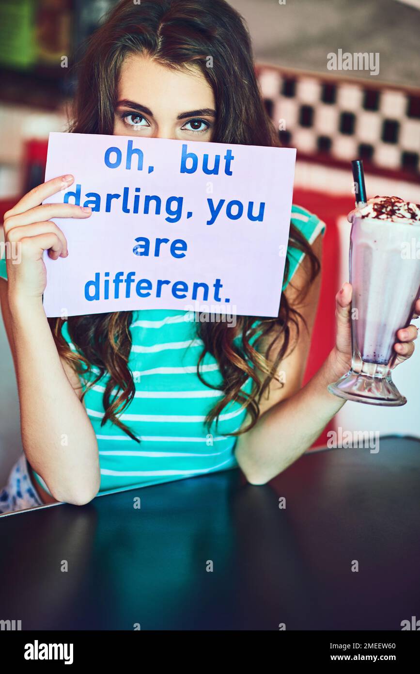 Make a statement. Cropped portrait of an attractive young woman holding ...