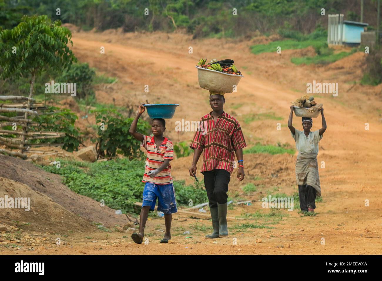 Local African People doing daily job in Ghana Village, Western Africa ...