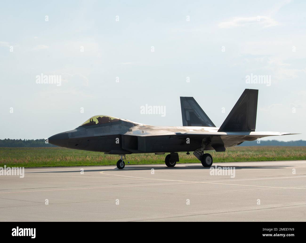 A U.S. Air Force F-22 Raptor assigned to the 90th Expeditionary Fighter ...