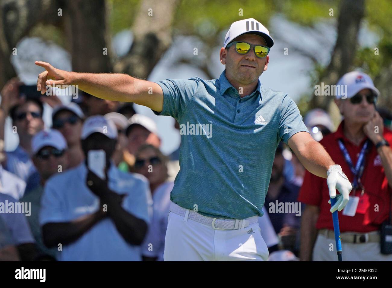 Sergio Garcia, of Spain, reacts to his tee shot on the seventh hole ...