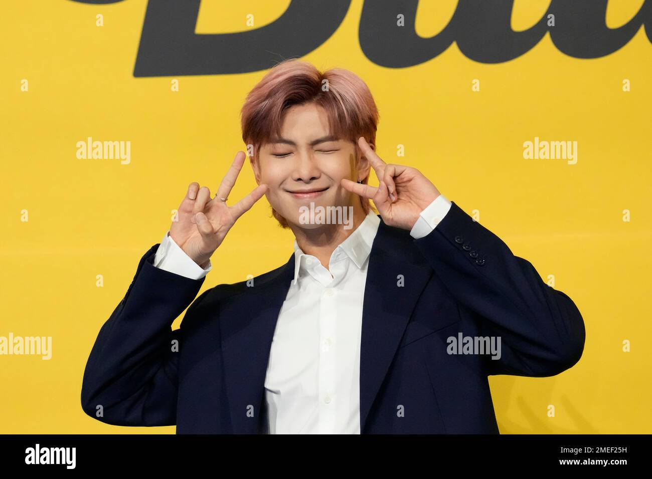 RM, a member of South Korean K-pop band BTS poses for photographers ...