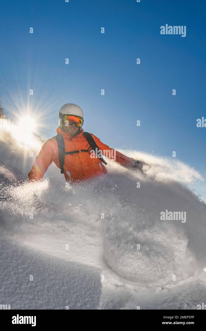 A boy skier in the powdery snow Stock Photo - Alamy