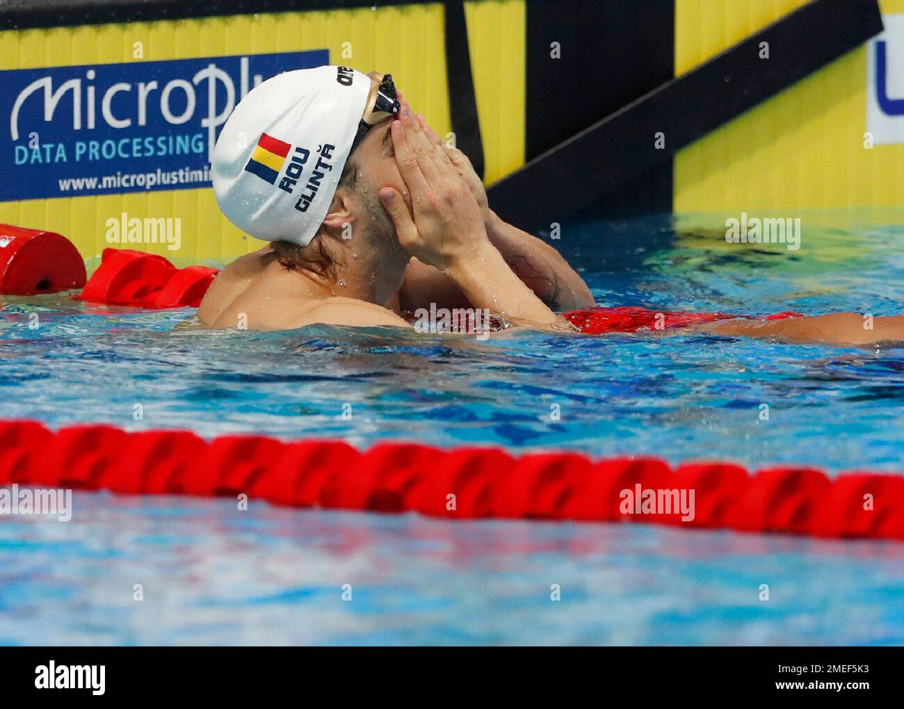 Romania's Robert Andrei Glinta celebrates after winning the men's 100 ...