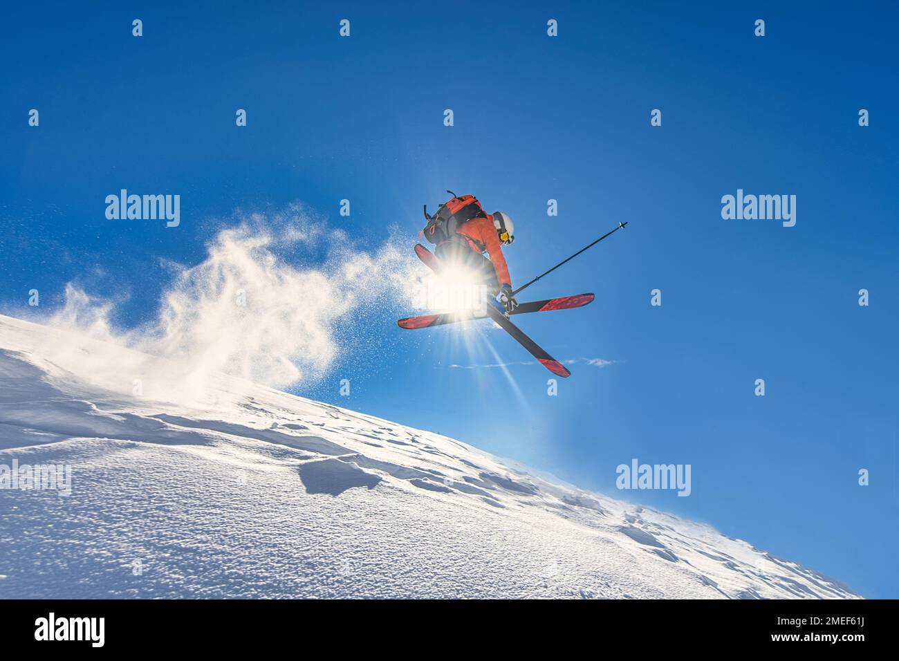 A boy performs an off-piste ski jump Stock Photo - Alamy