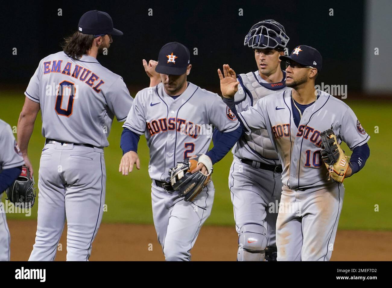 Houston Astros' Kent Emanuel, from left, celebrates with Alex Bregman ...