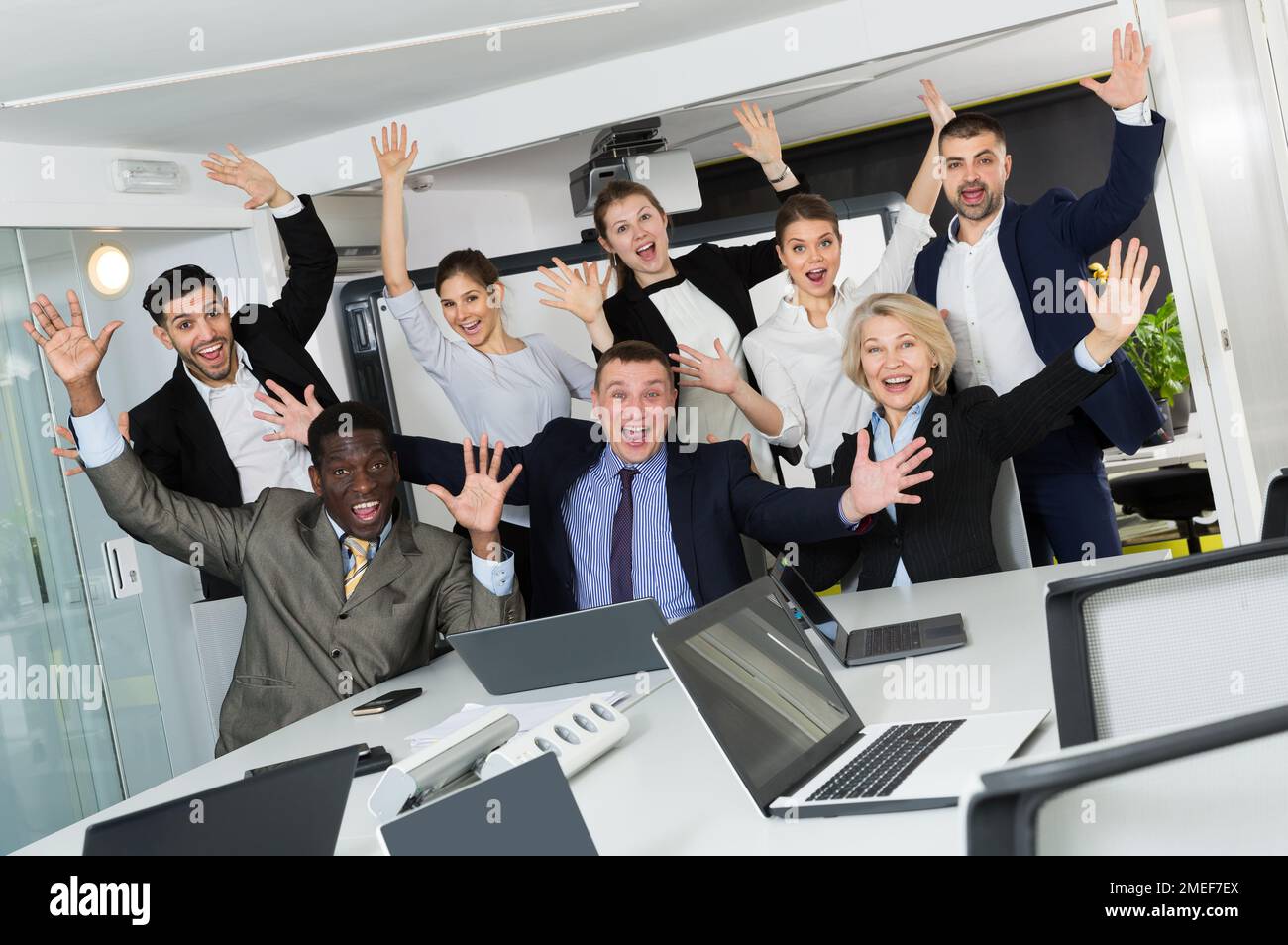 business people rejoice at victory Stock Photo - Alamy