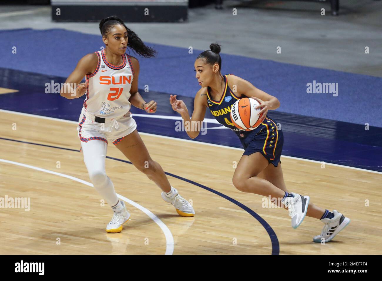 Connecticut Sun's DiJonai Carrington (21) defends Indiana Fever's Kysre ...