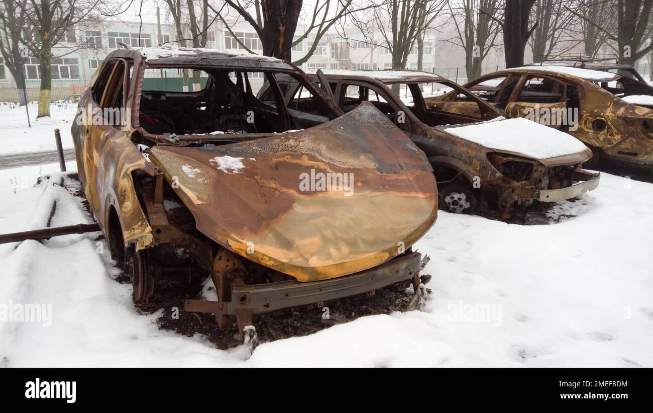 Burnt cars body on the street. The car after the fire. Burned out car ...