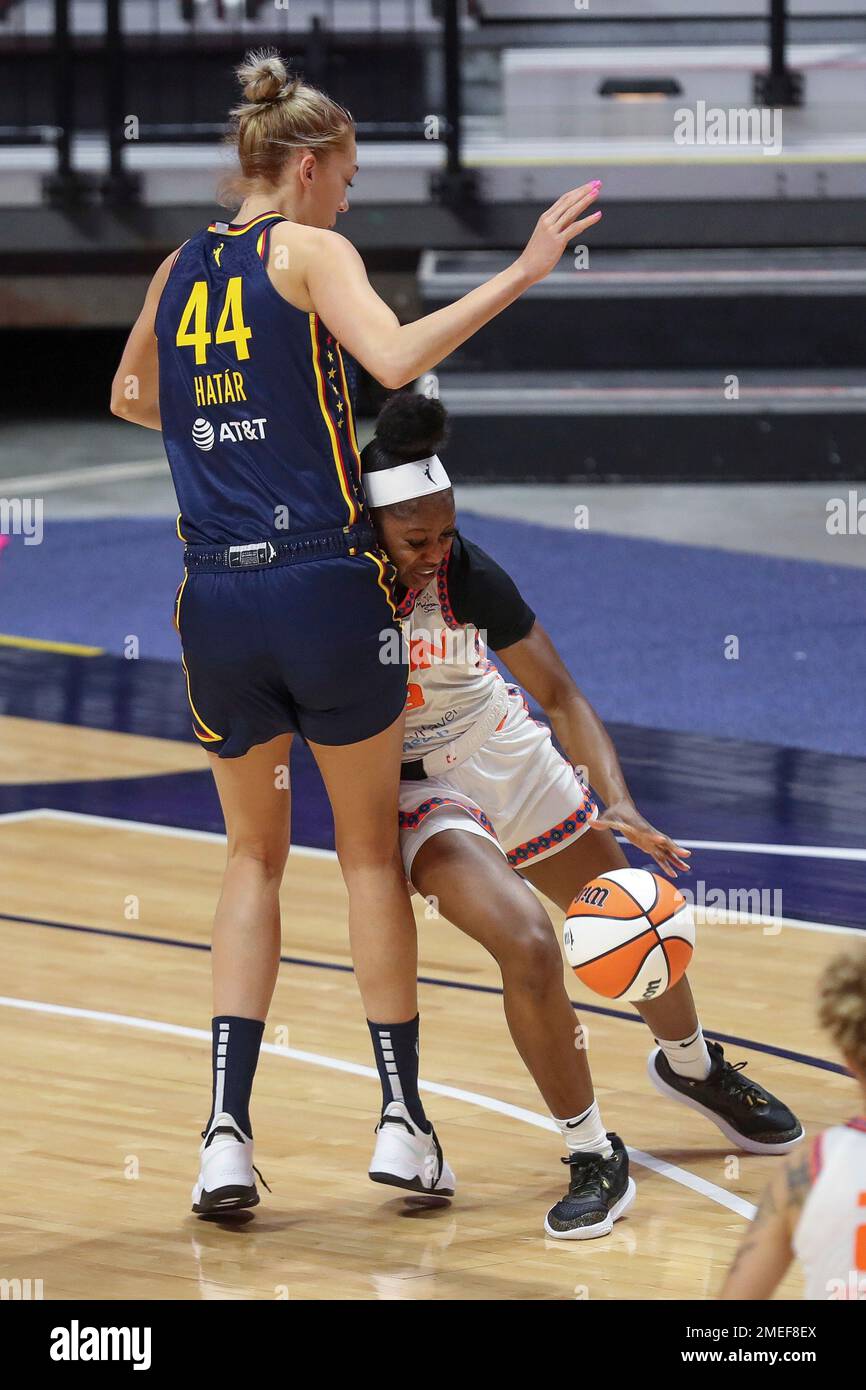 Indiana Fever's Bernadett Hatar (44) fouls Connecticut Sun's Kaila ...