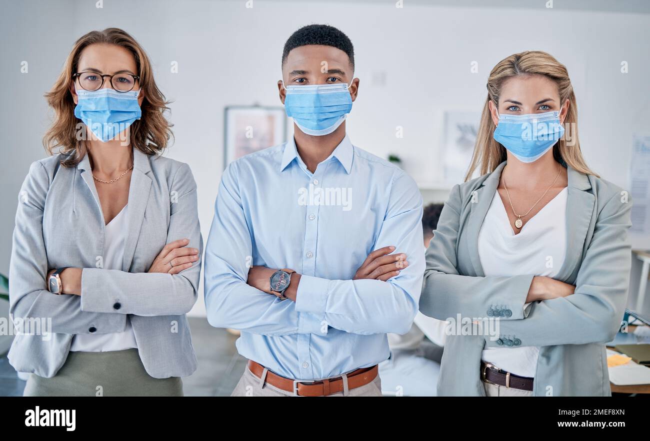 Office team, group portrait and mask with arms crossed, safety or ...