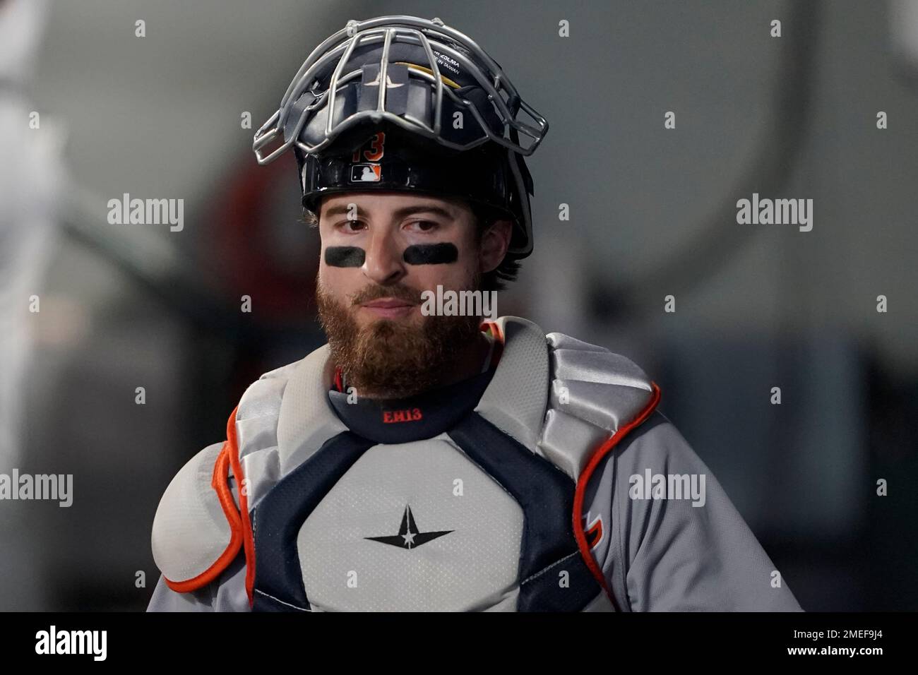 Detroit Tigers catcher Eric Haase walks in the dugout during a starting ...