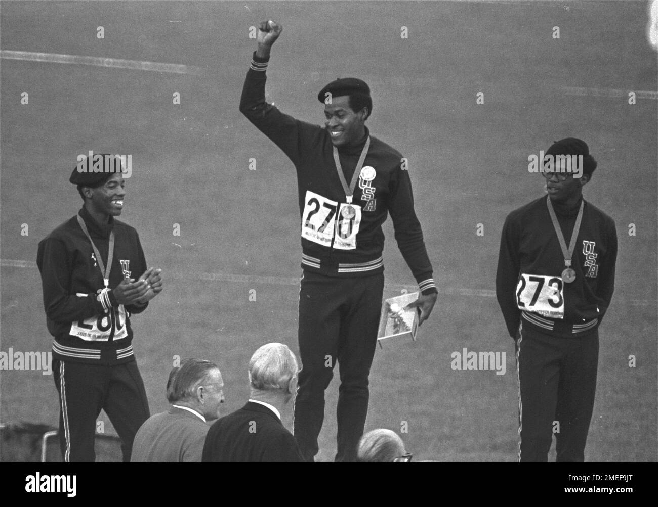 FILE - United States runners Larry James, left, Lee Evans, center, and ...