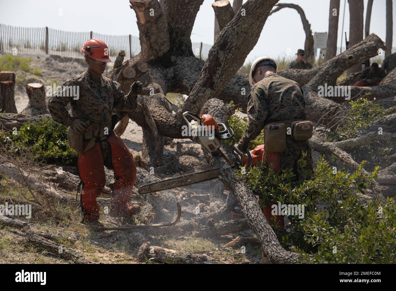 U.S. Marine Corps Sgt. Helwin Acabal, left, and Sgt. Alexander Mount ...