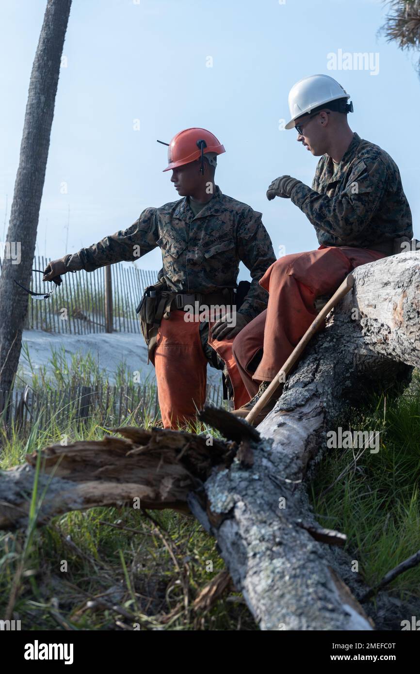 U.S. Marine Corps Sgt. Helwin Acabal Royal, left, and Sgt. Alexander ...