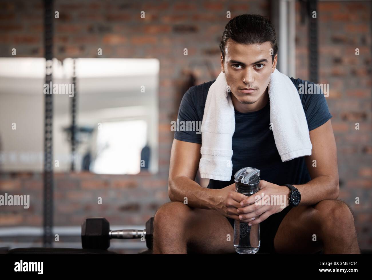 Muscular young bodybuilder in relaxed hi-res stock photography and ...