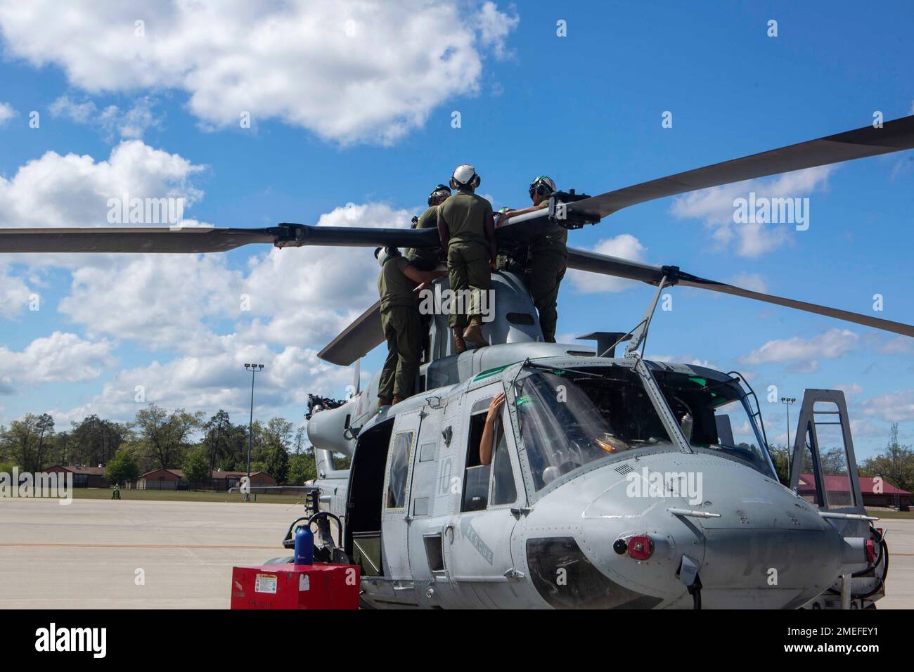U.S. Marines with Marine Light Attack Helicopter Squadron (HMLA) 167 ...