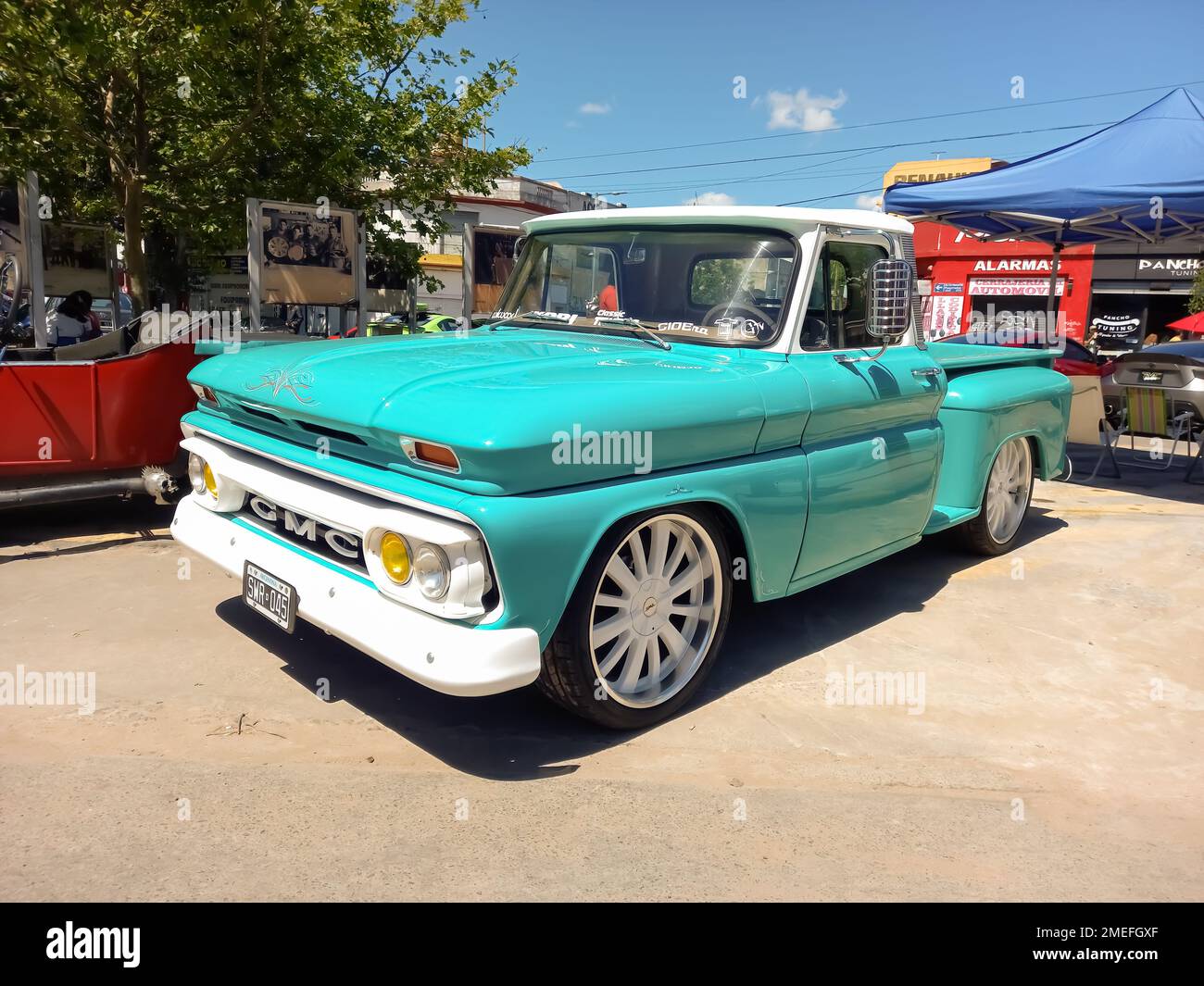 old aqua 1960s GMC pickup truck built by General Motors in the street ...