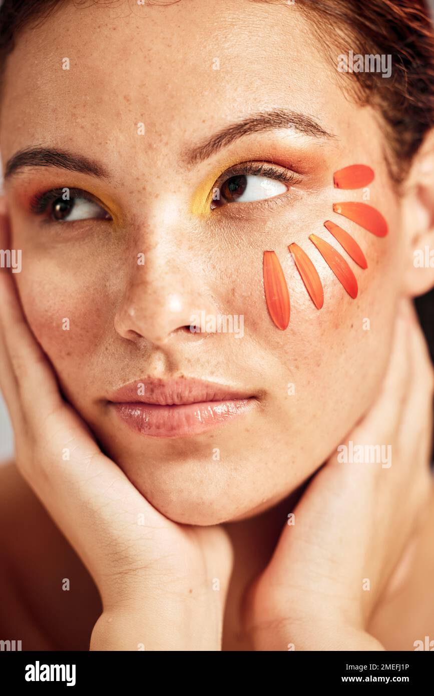 Face, makeup and flower petal on woman skin for beauty with dermatology ...