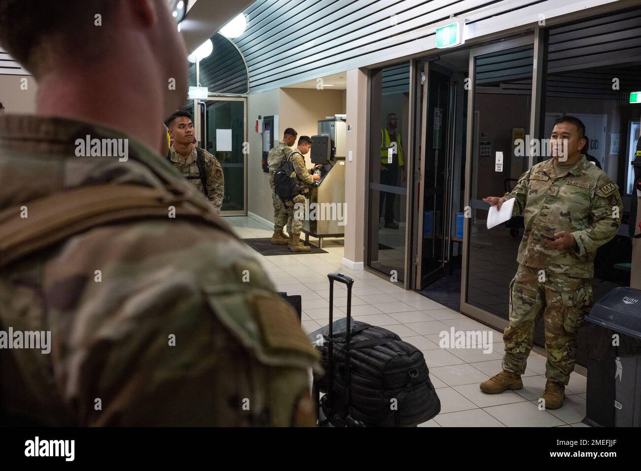U.S. Air Force Airmen receive a brief from Master Sgt. Jino Antolin ...