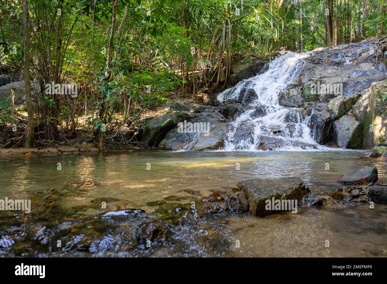 The foamy Pirate Waterfall in Koh Adang Thailand surrounded by the ...