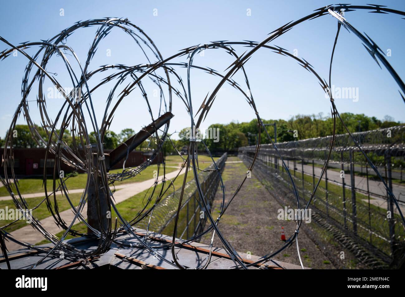 Razor wire surrounds the perimeter fencing at the former Arthur Kill ...