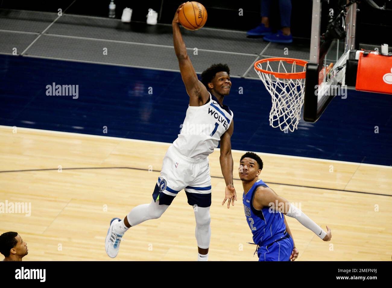 Minnesota Timberwolves forward Anthony Edwards (1) dunks in front of ...