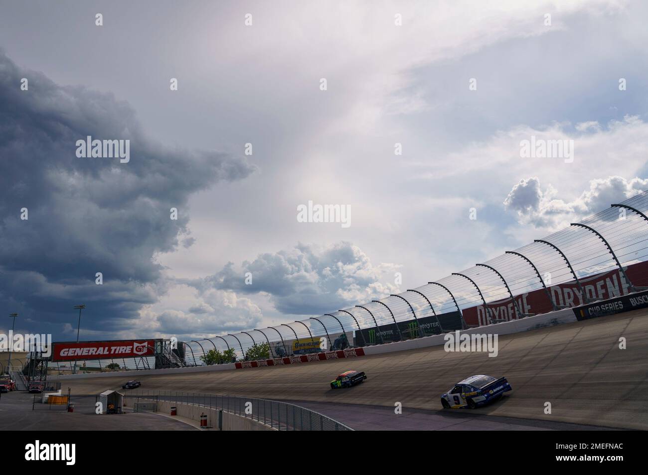 Drives go around turn two during a NASCAR Cup Series auto race at Dover ...