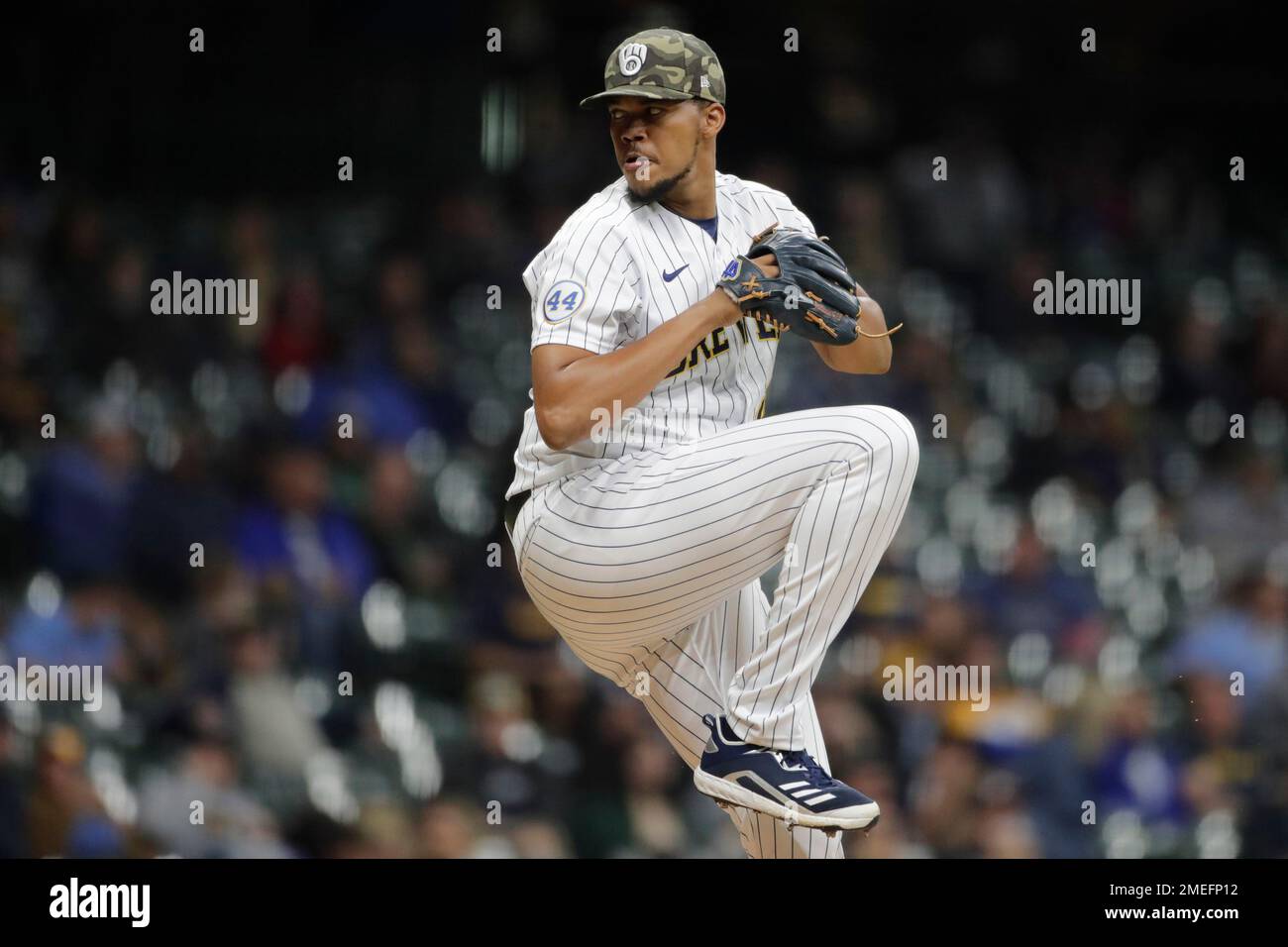 Milwaukee Brewers' Angel Perdomo pitches during the seventh inning of a ...
