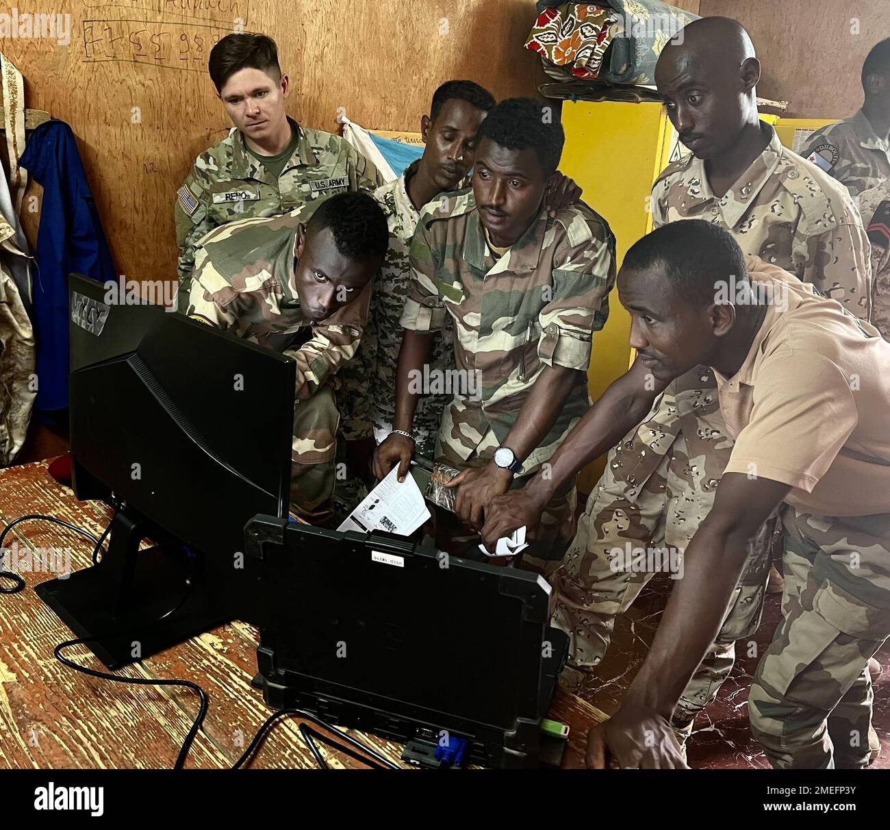 Kentucky National Guard Staff Sgt. Jeffrey Reno, left, observes as ...