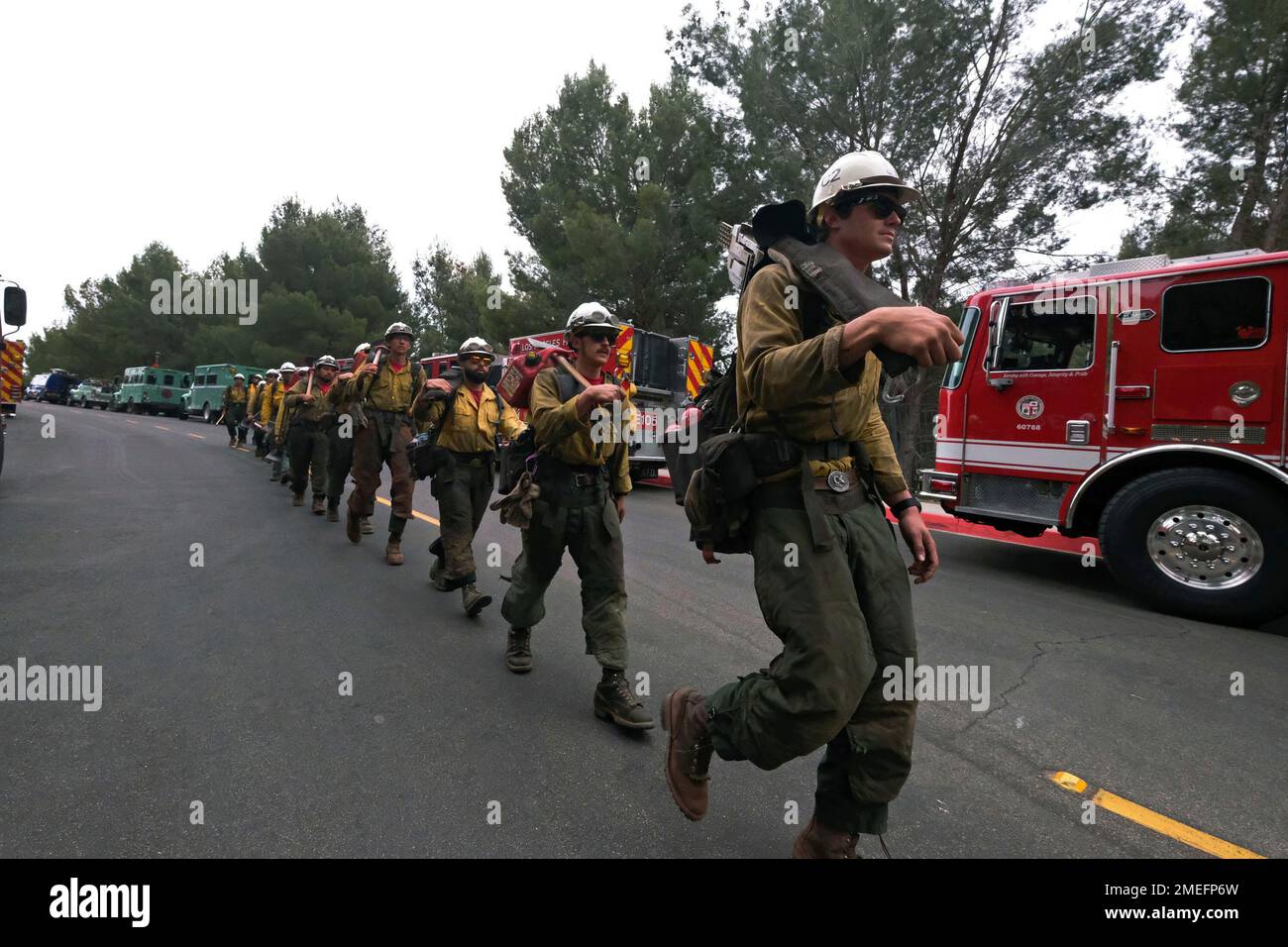 A Hotshots fire crew walks in line to fight the wildfire in the Pacific ...