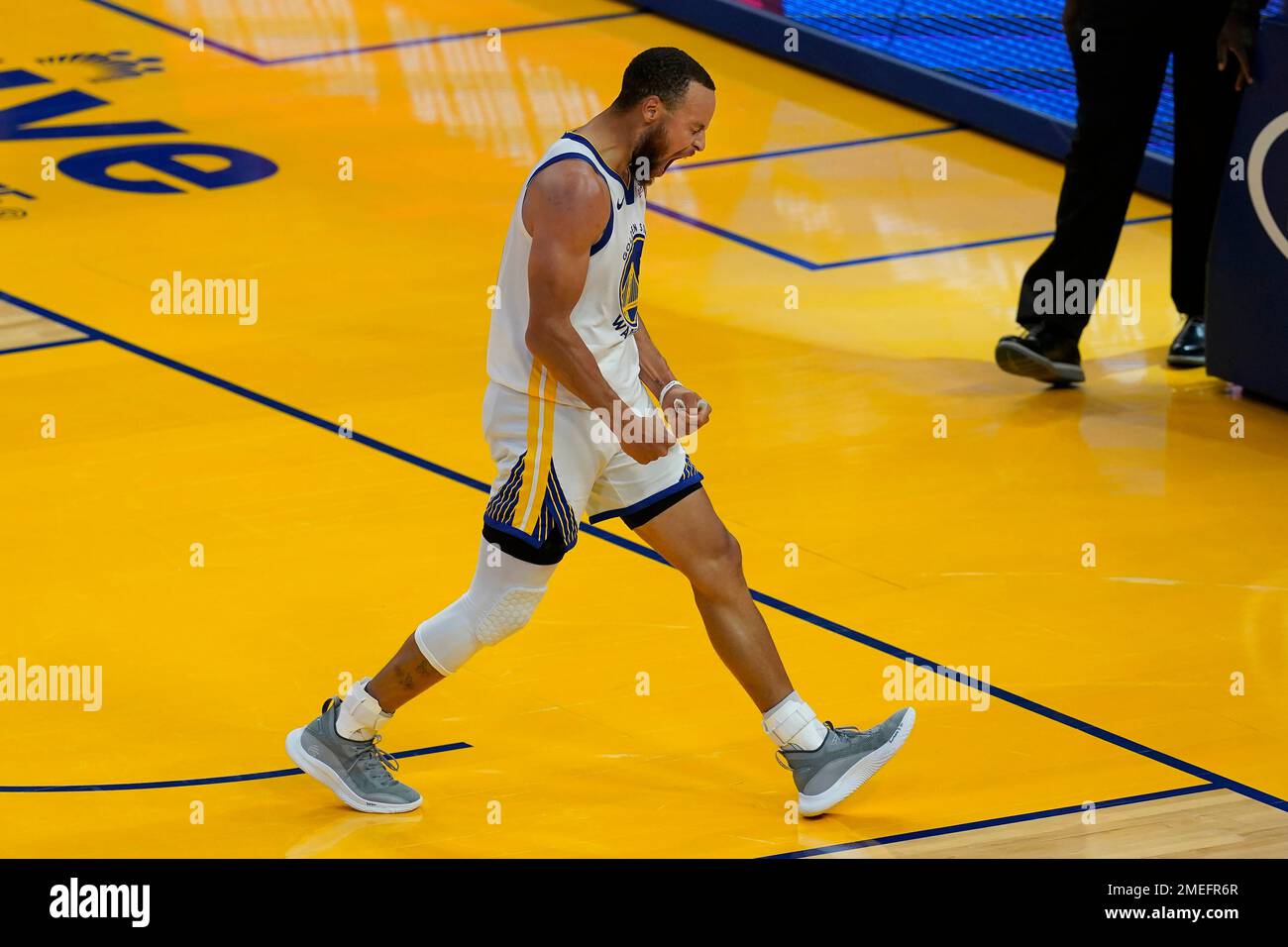 Golden State Warriors guard Stephen Curry (30) reacts after shooting a 3-point basket against ...