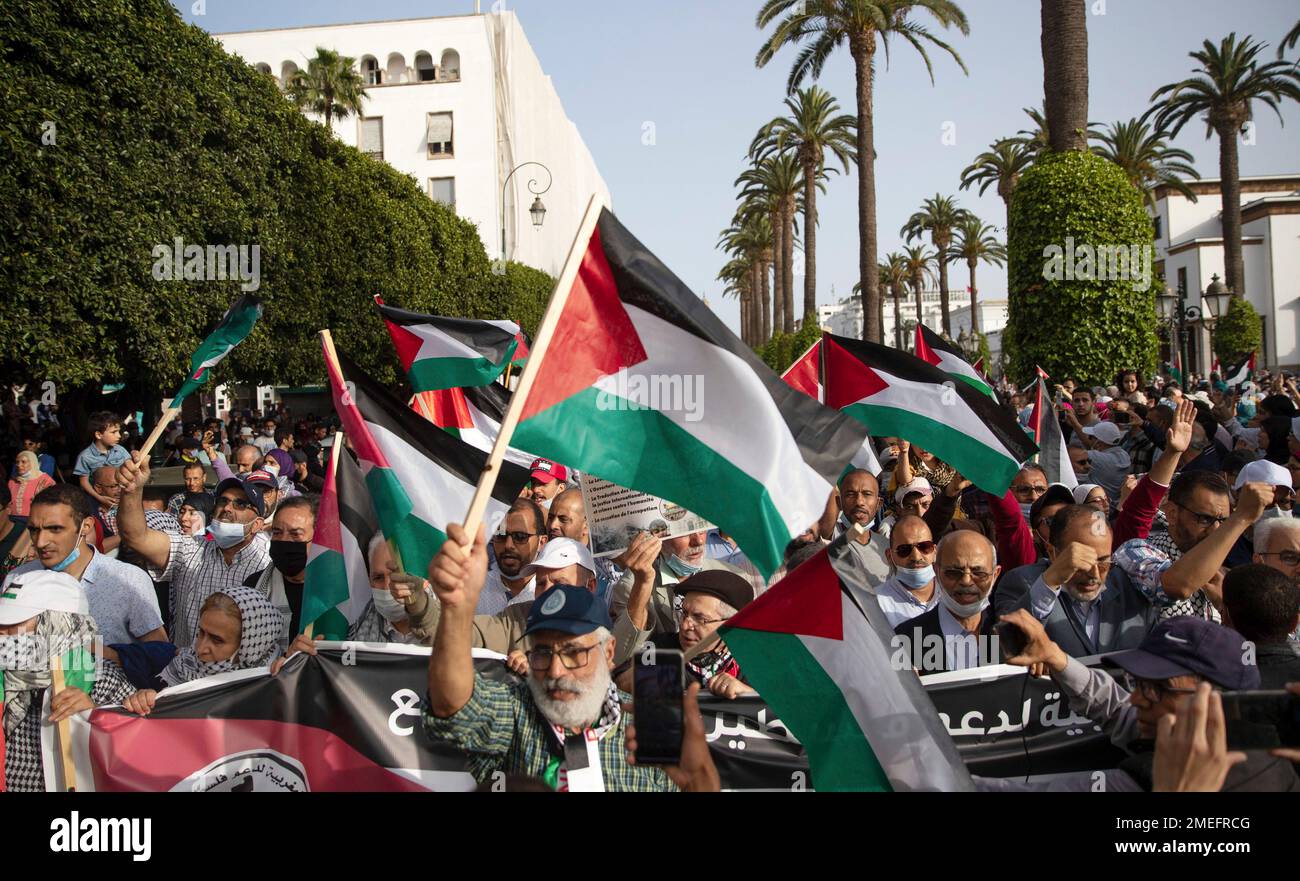 Protesters Shout Slogans And Wave Palestinian Flags During A Protest In