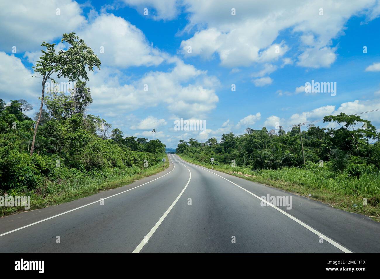 Accra, Ghana - April 04, 2022: Dusty Car on the Scenic African Road ...