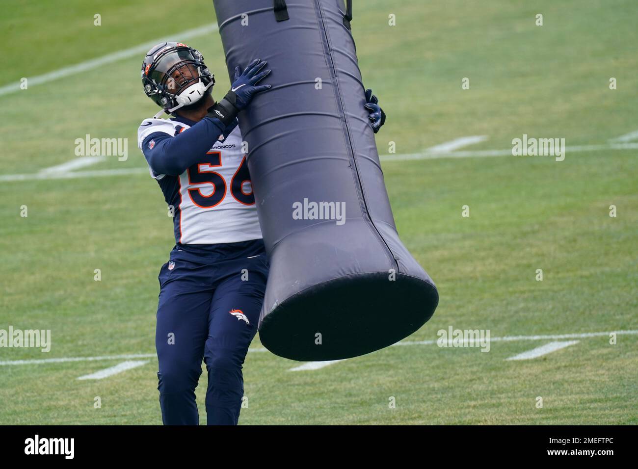 Denver Broncos linebacker Baron Browning takes part in a drill during ...