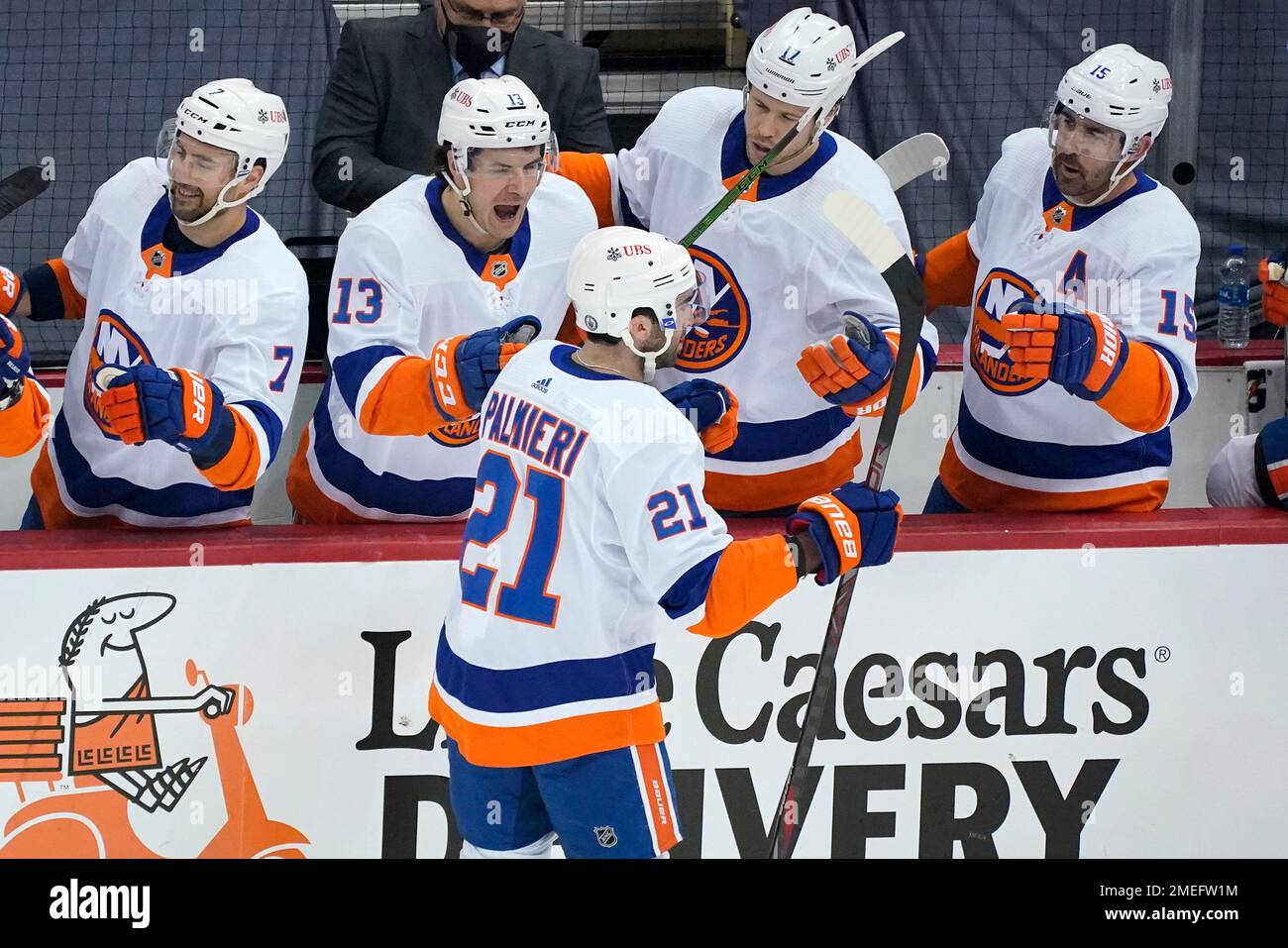 New York Islanders' Kyle Palmieri (21) returns to the bench after ...