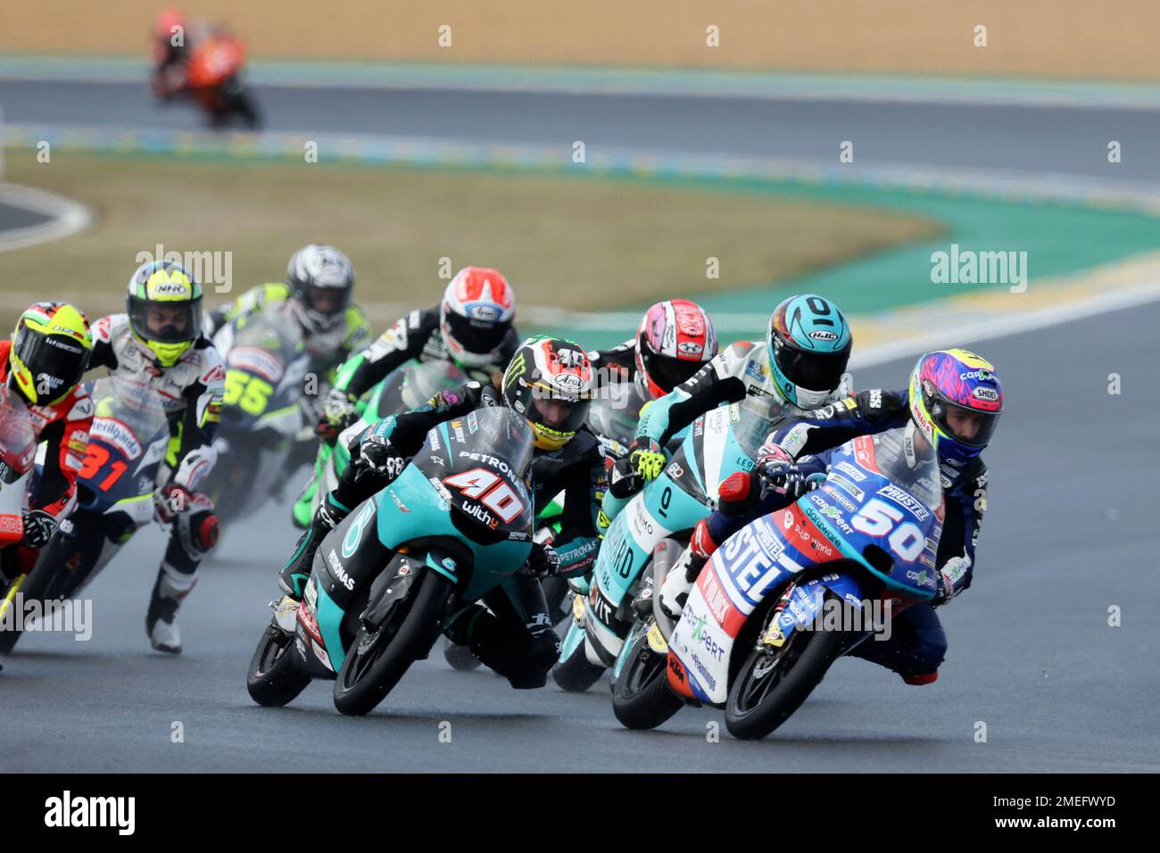 Moto3 riders Jason Dupasquier of Switzerland, right, and Darryn Binder ...