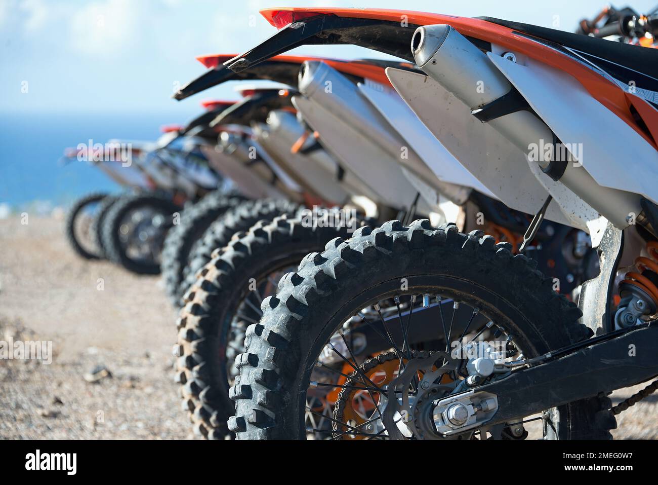 Motocross riders lined up before start on the race Stock Photo - Alamy