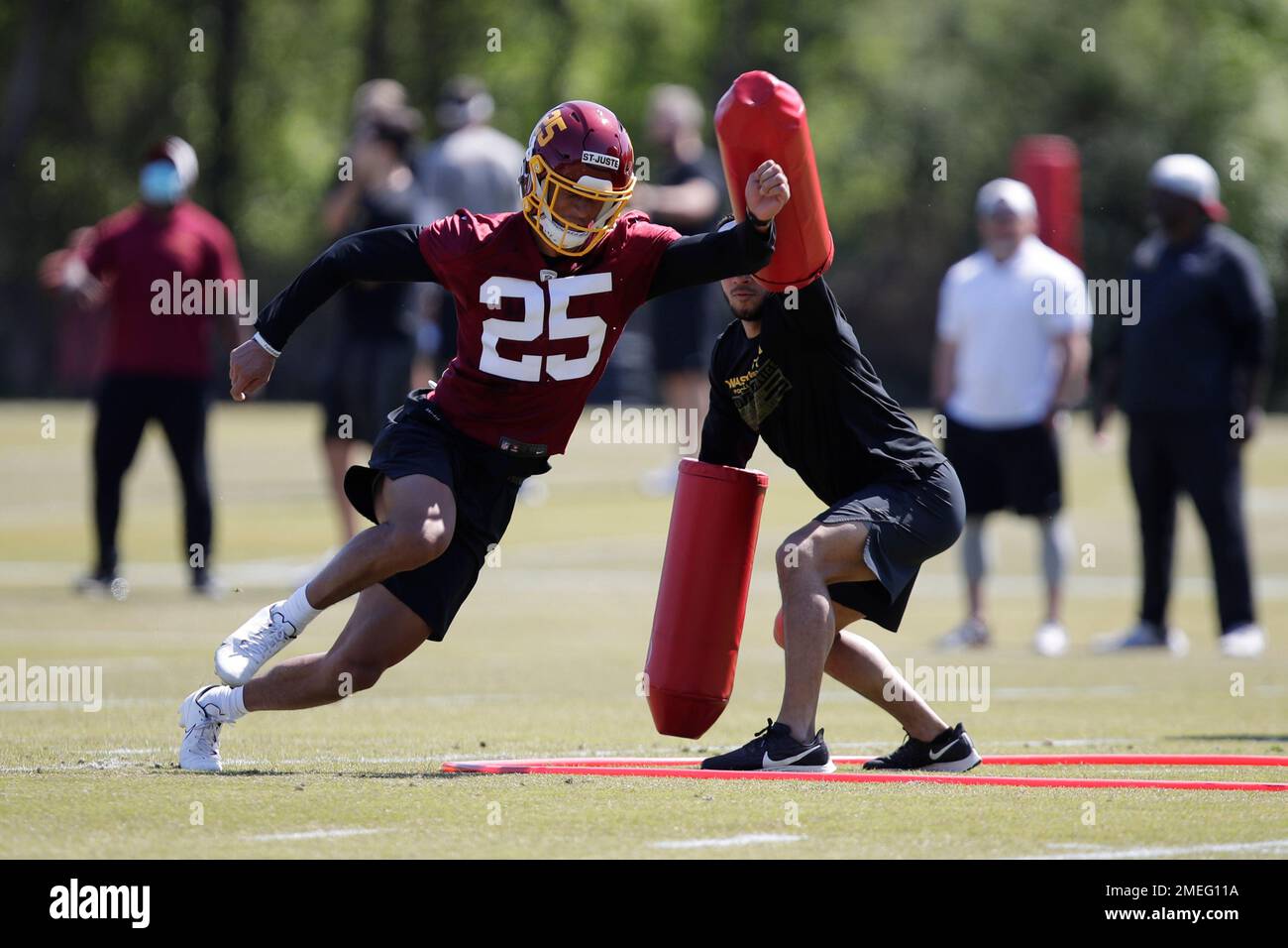 Washington Football Team cornerback Benjamin St-Juste (25) runs a drill ...