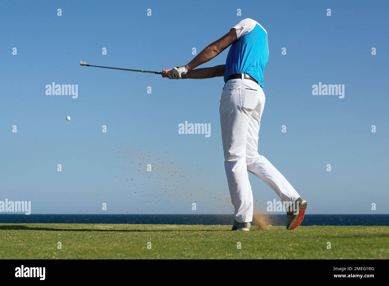 Golfer hitting ball hi-res stock photography and images - Alamy