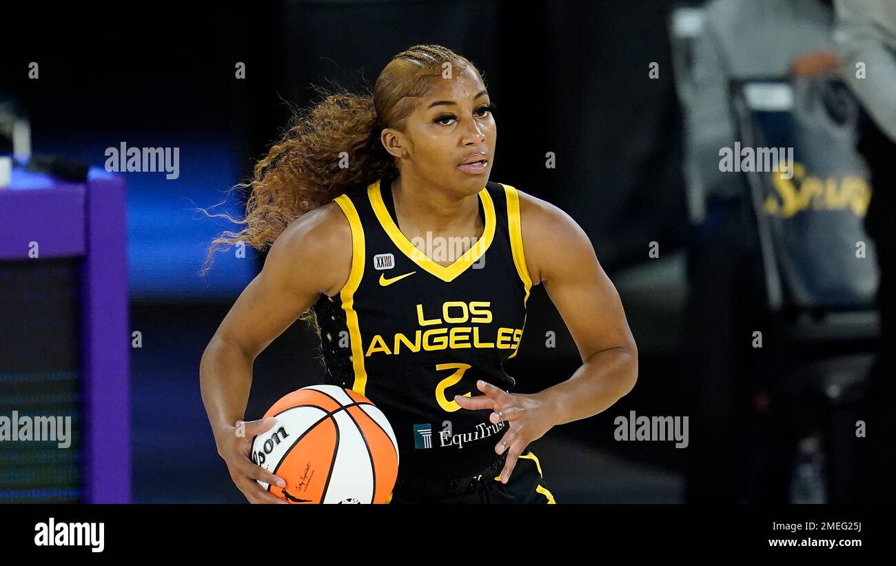 Los Angeles Sparks guard Te'a Cooper (2) controls the ball during a ...