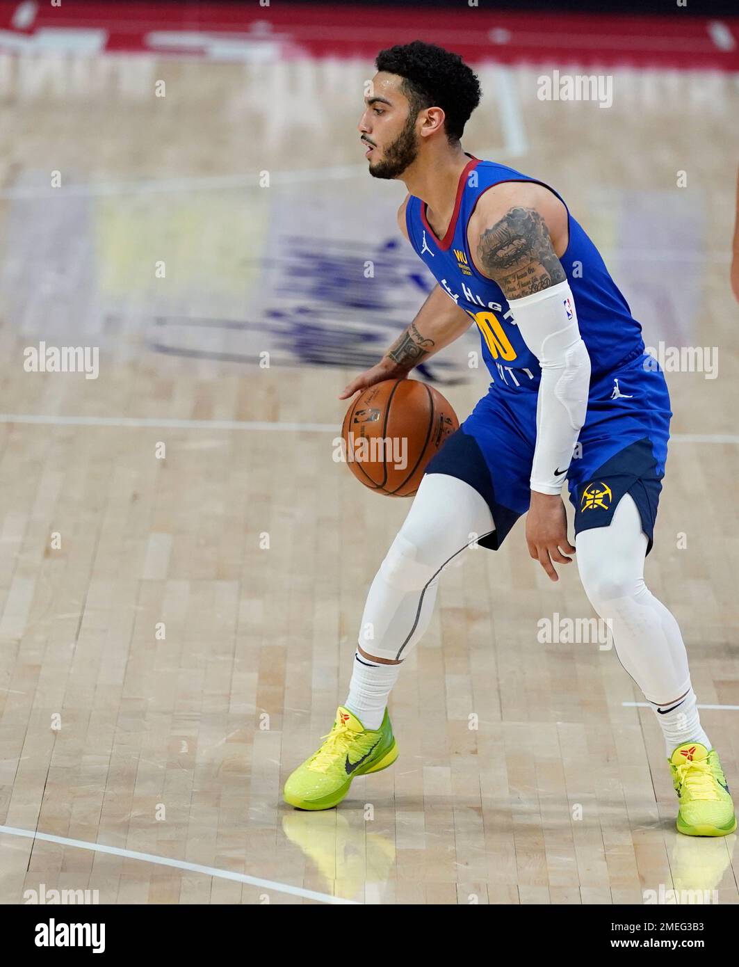 Denver Nuggets guard Markus Howard controls the ball during the first ...