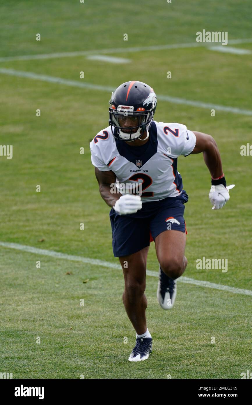 Denver Broncos cornerback Pat Surtain II takes part in drills during an ...